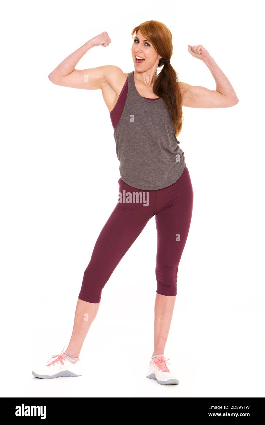 Mature woman flexing biceps hi-res stock photography and images - Alamy