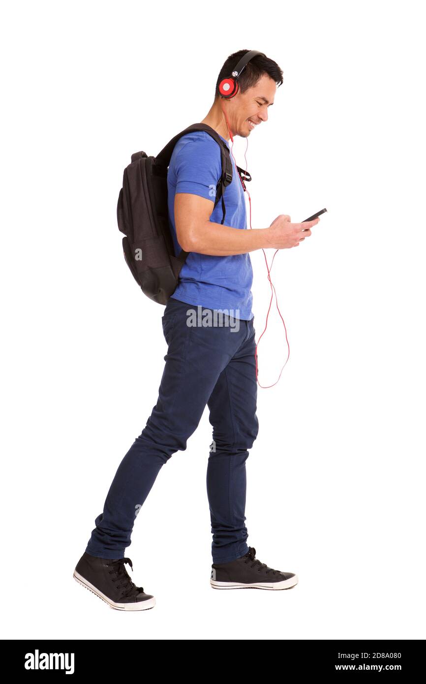 Happy traveler walking on Cut Out Stock Images & Pictures - Alamy