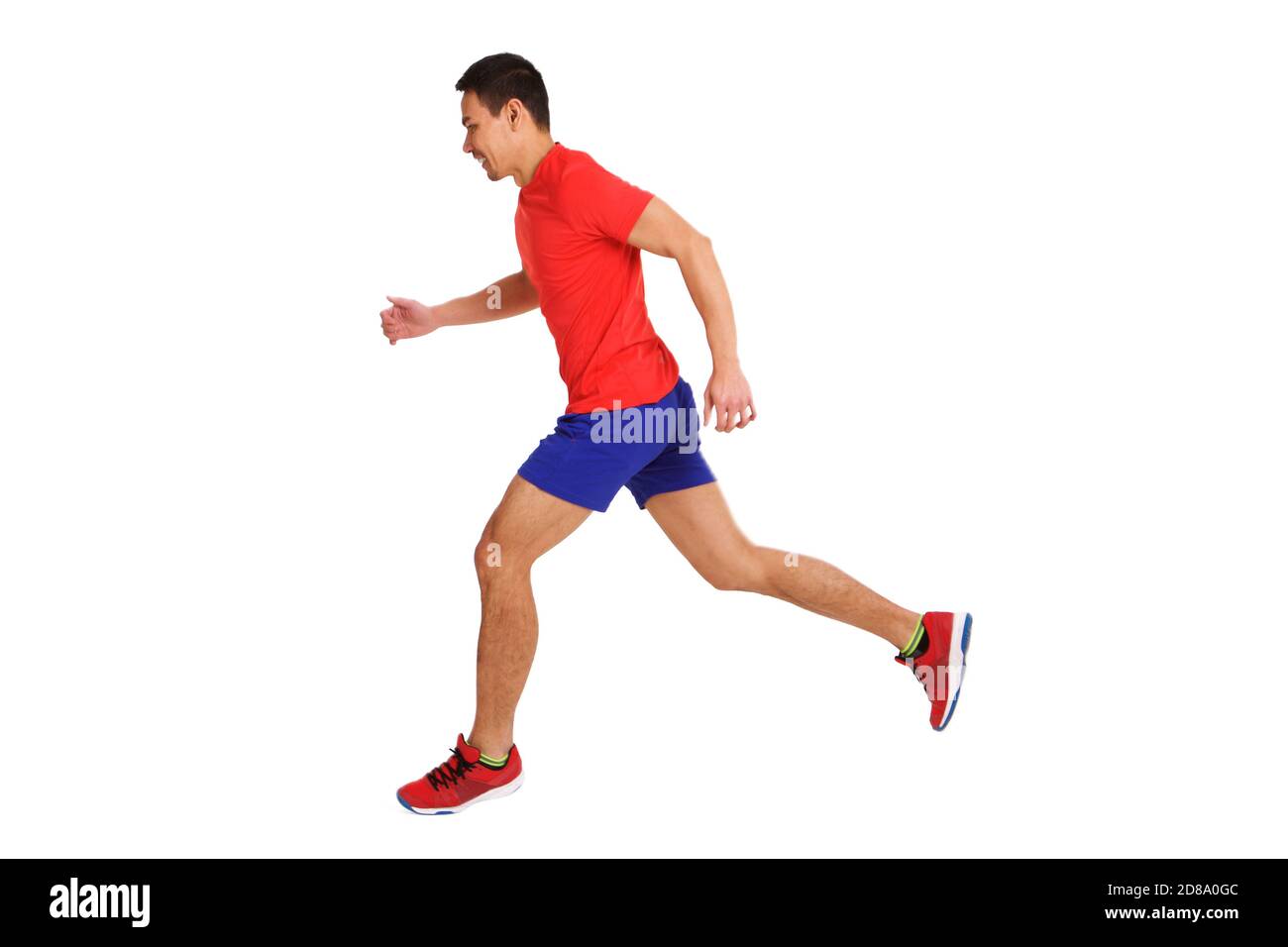 Full length side portrait of fit older asian man running over white ...