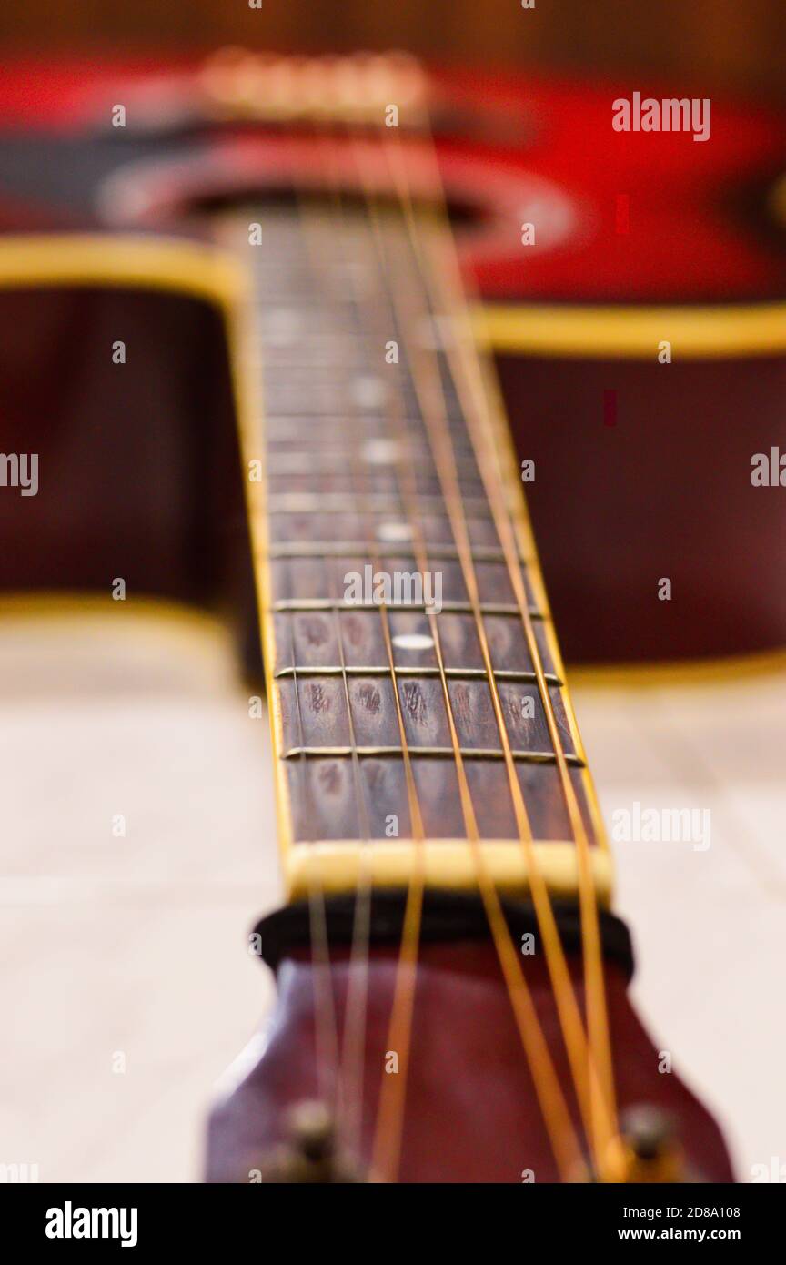 Close-up guitar fretboard with strings isolated. blur photo Stock Photo ...