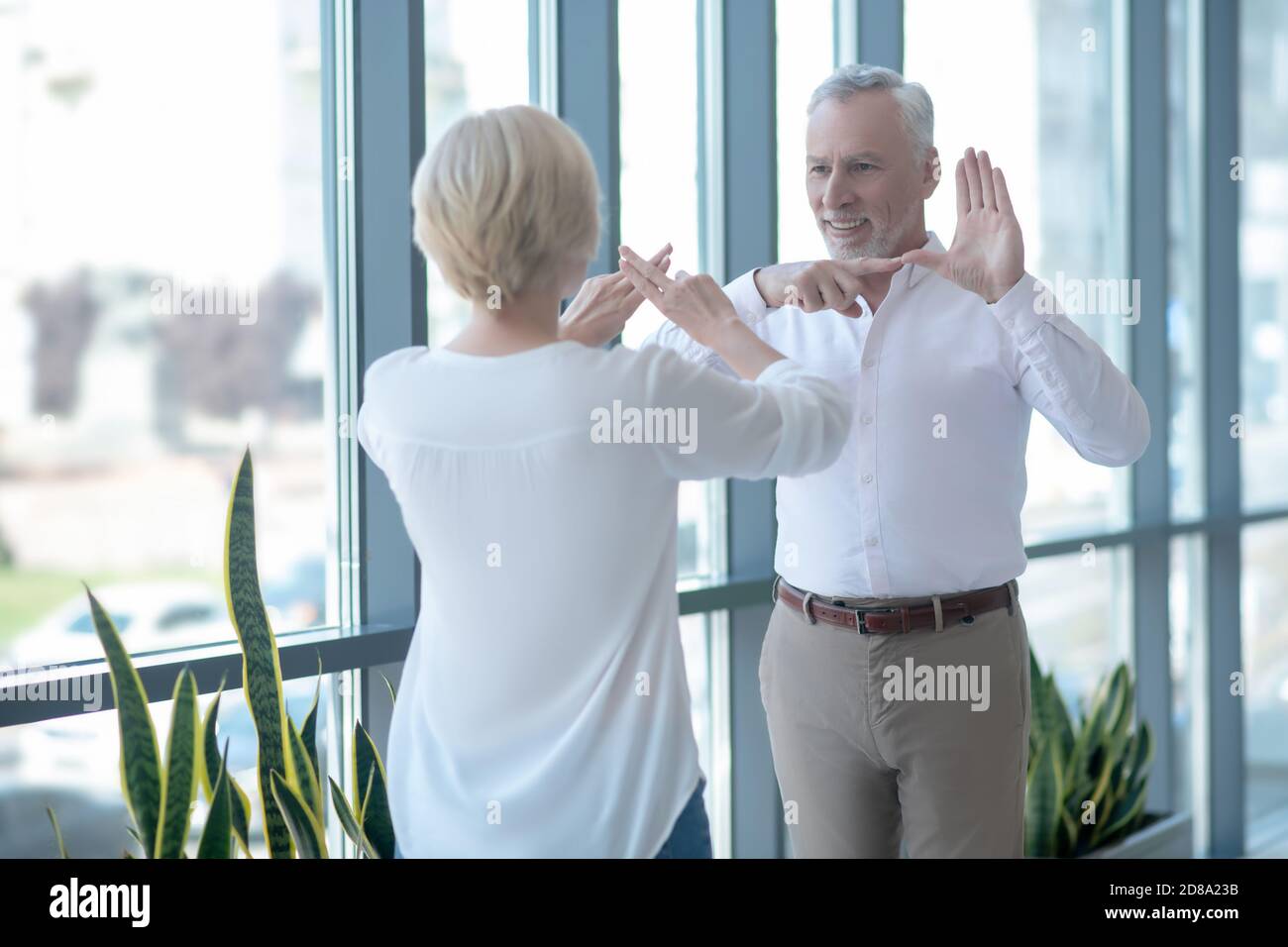 Adult sign language hi-res stock photography and images - Alamy