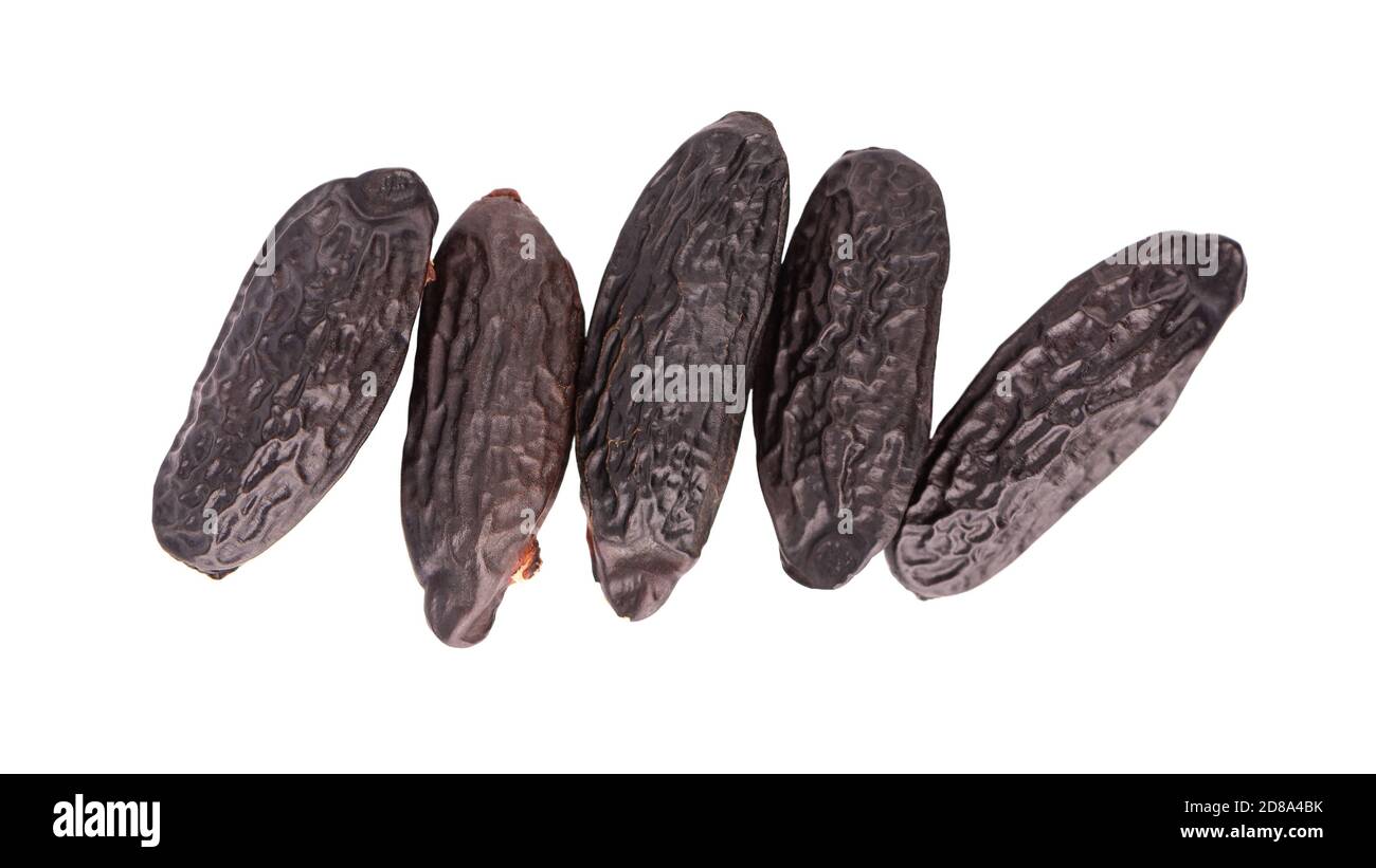 Tonka beans isolated on white background. Bean of Dipteryx odorata ...
