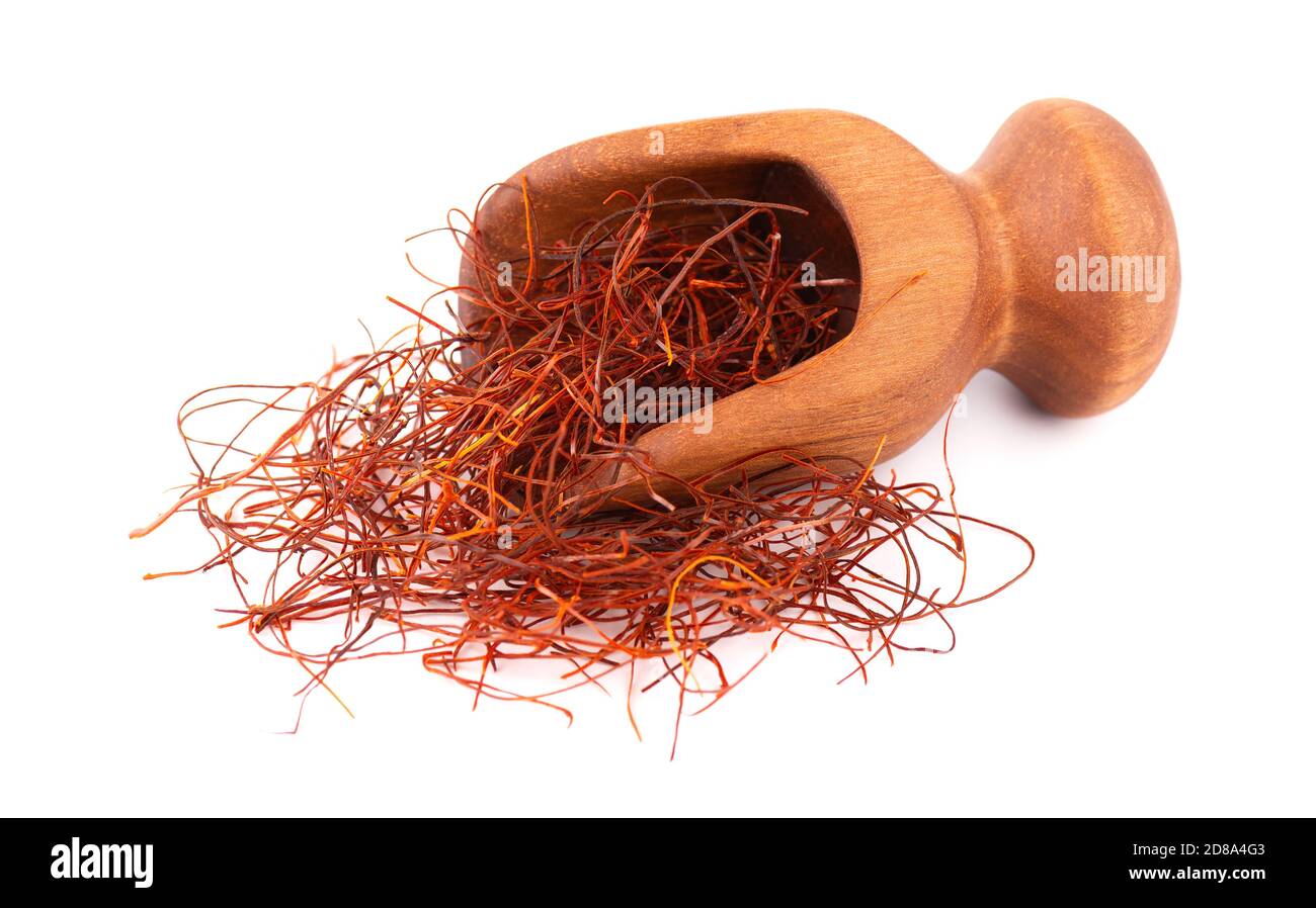 Red chili pepper threads in wooden scoop, isolated on white background ...