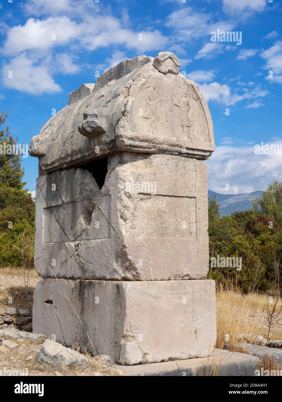 The beautiful lycian carved stone tomb located on the hill of ancient ...
