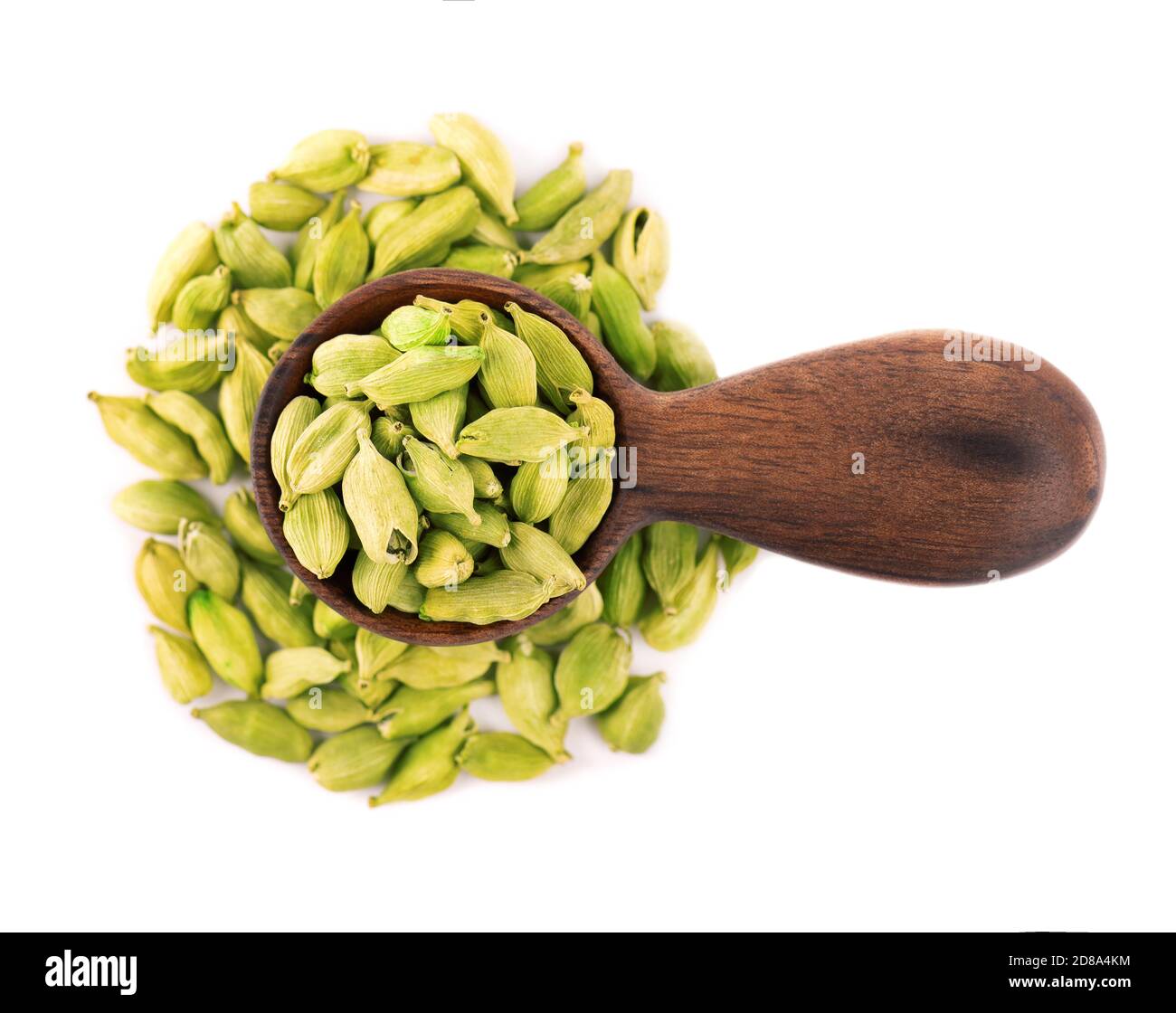 Cardamom seeds in wooden spoon, isolated on white background. Pile of ...
