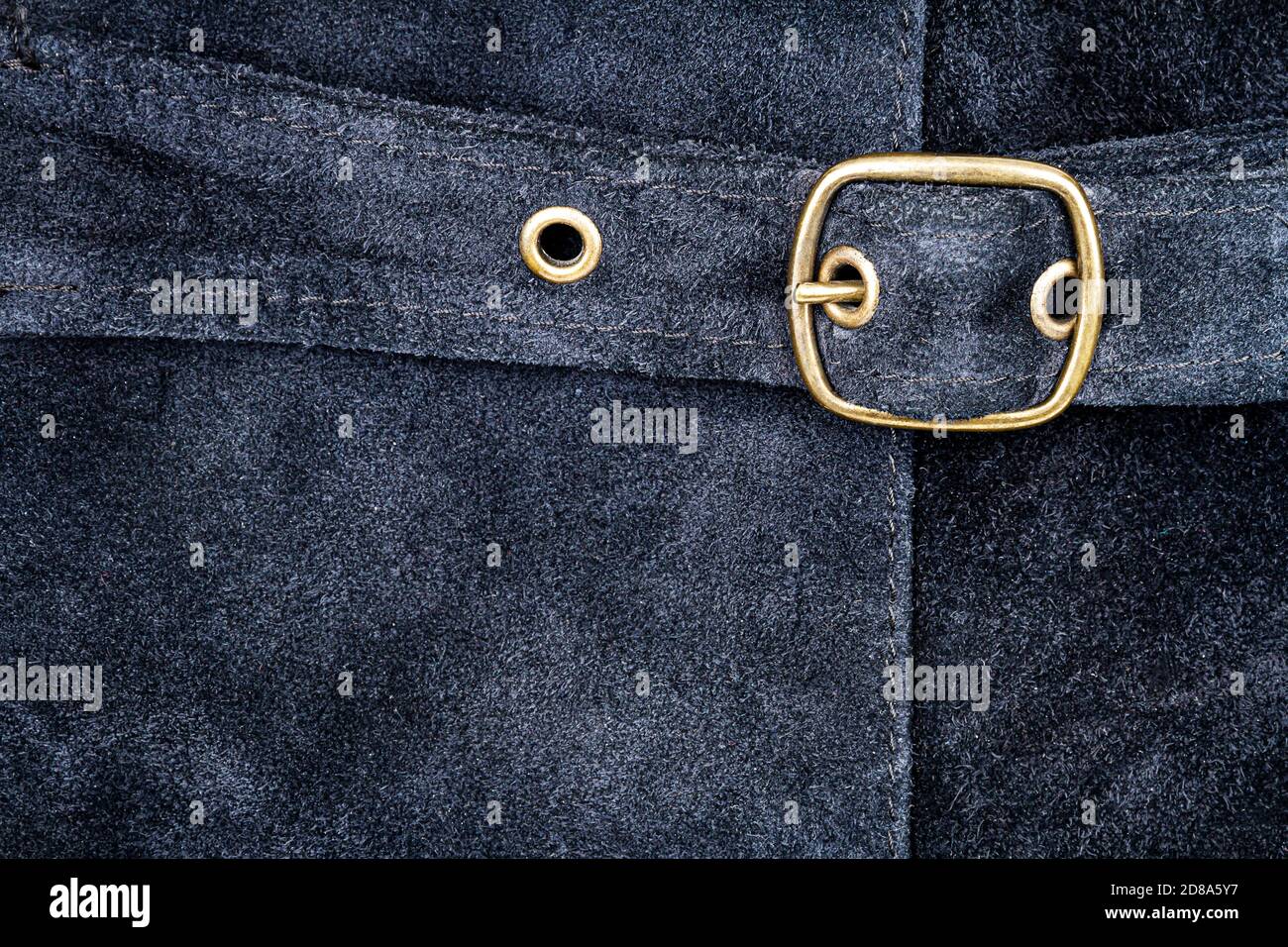 Genuine blue suede texture with a belt and buckle. Abstract vintage ...