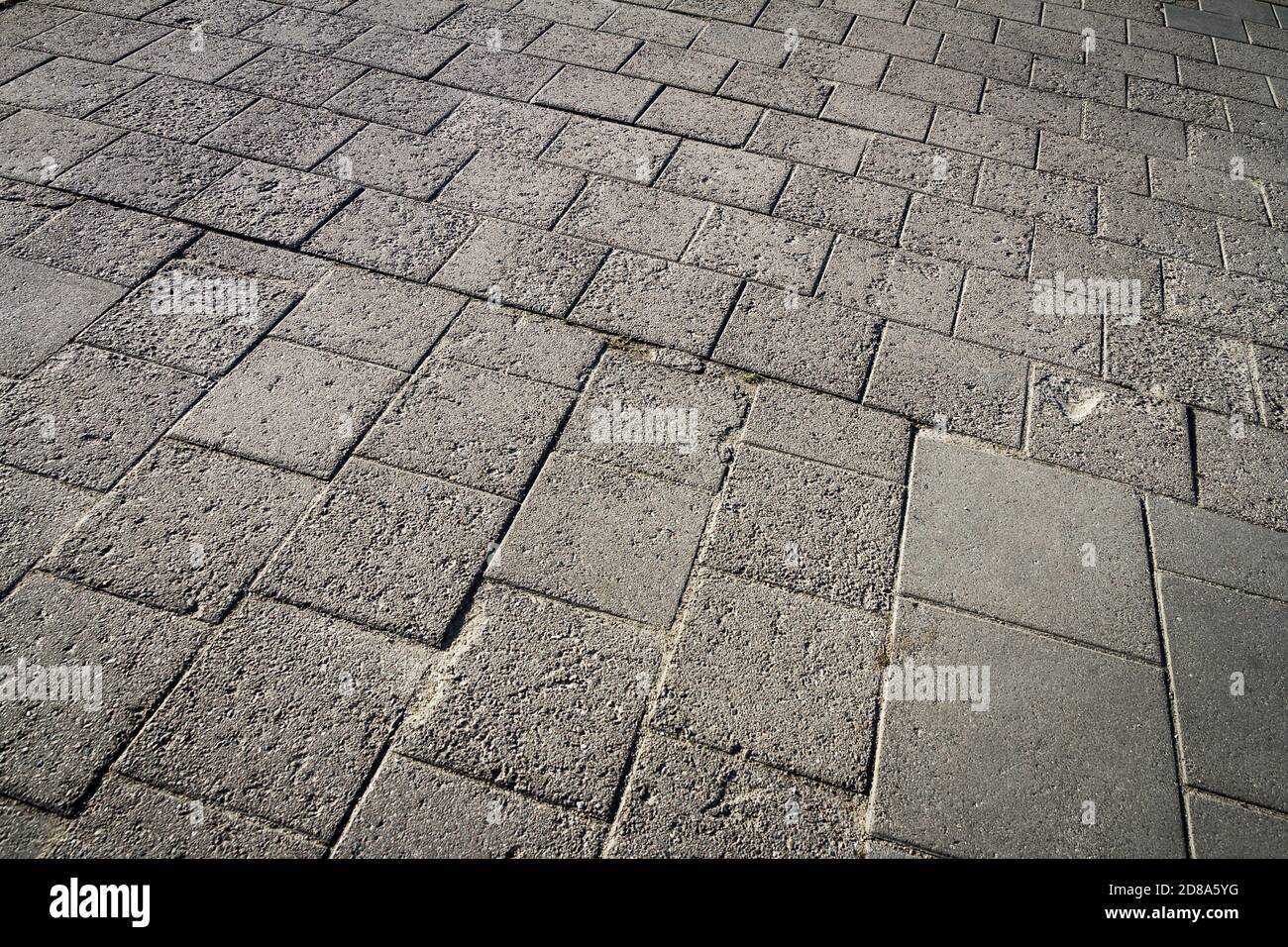 Old concrete tiles in the walkway. Abstract architecture background ...