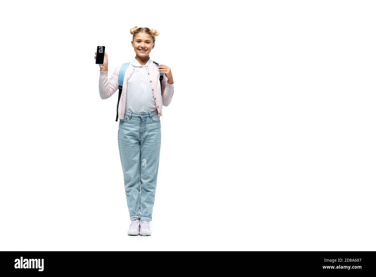 Schoolkid pointing with finger at smartphone on white background Stock ...