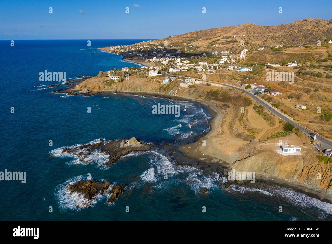 Aerial view of Tpoulorotsos Beach and the rugged coastline at Pomos ...