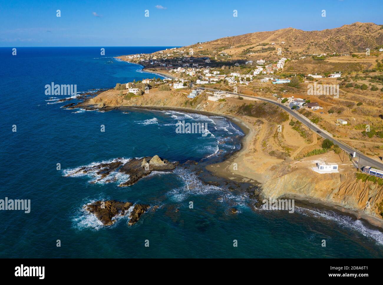 Aerial view of Tpoulorotsos Beach and the rugged coastline at Pomos ...
