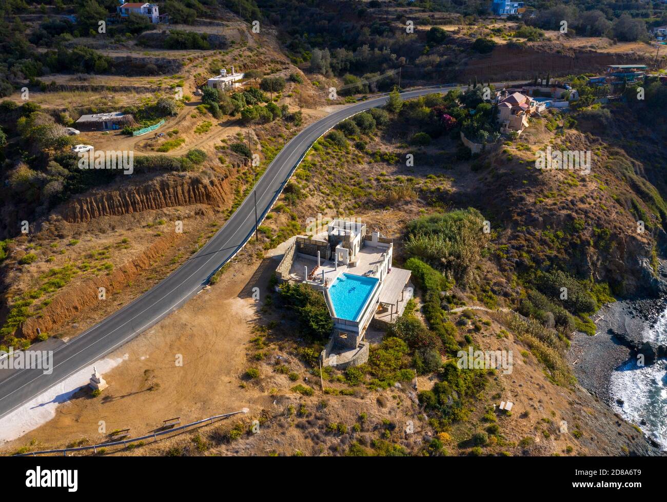 Aerial view of Tpoulorotsos Beach and the rugged coastline at Pomos ...