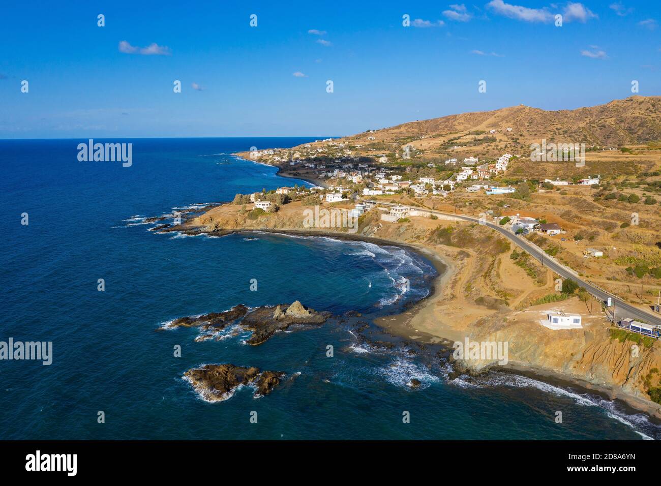 Aerial view of Tpoulorotsos Beach and the rugged coastline at Pomos ...