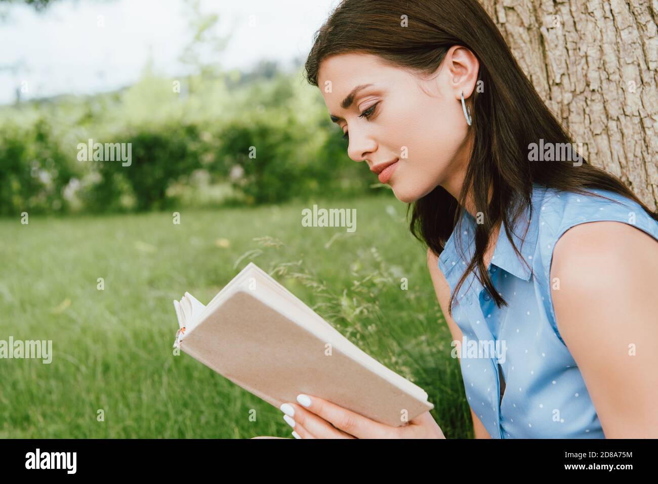 Woman emotional book hi-res stock photography and images - Alamy