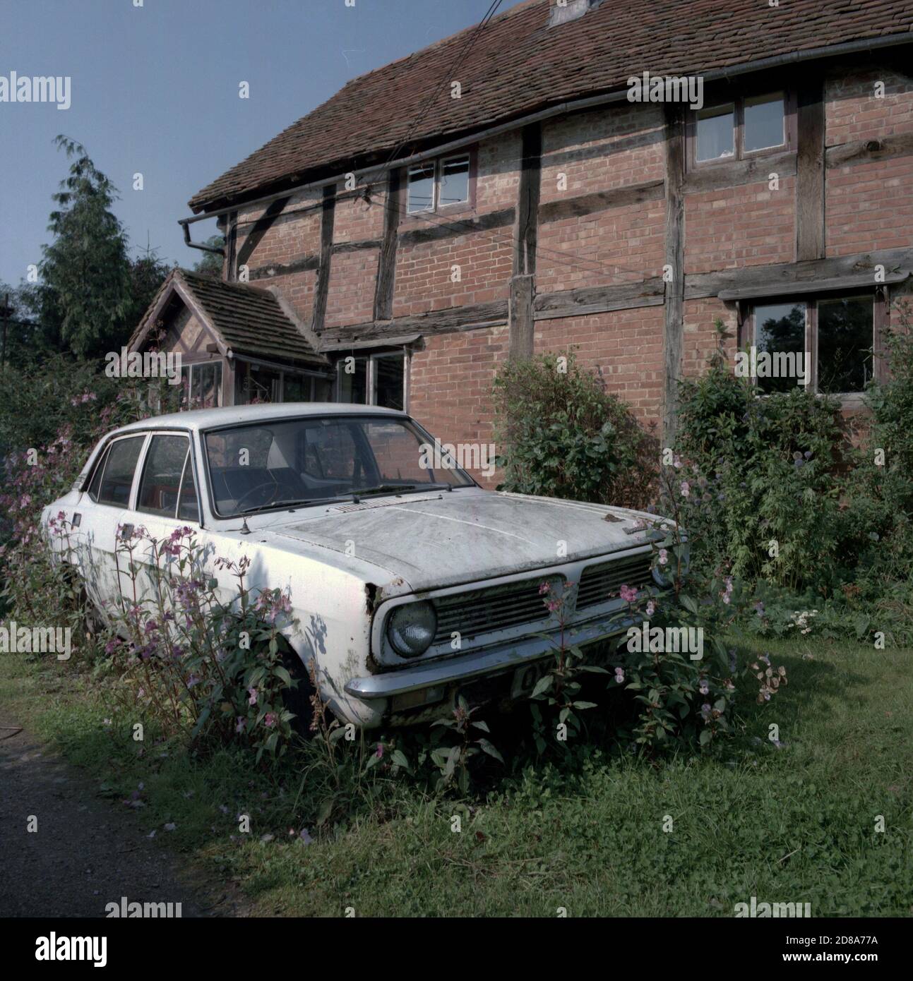 Old car & Tudor cottage Barston Solihull Stock Photo - Alamy