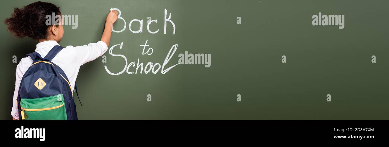 School girl back view uniform hi-res stock photography and images - Alamy