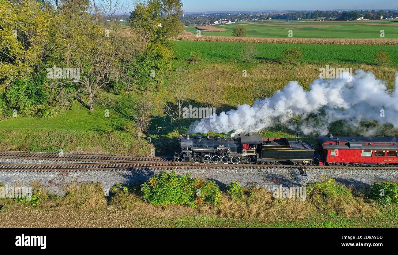 Aerial View of Steam Passenger Train Puffing Smoke Traveling in Amish ...