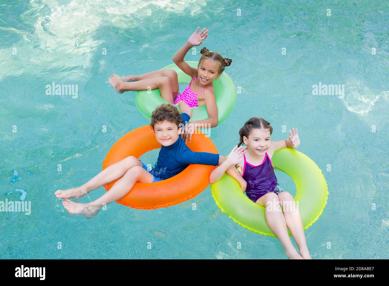 Children Waving Hands High Resolution Stock Photography and Images - Alamy