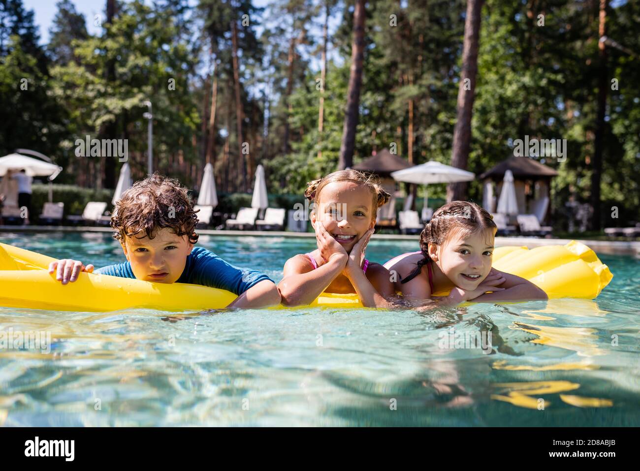 Youngster Floating In Pool High Resolution Stock Photography and Images ...