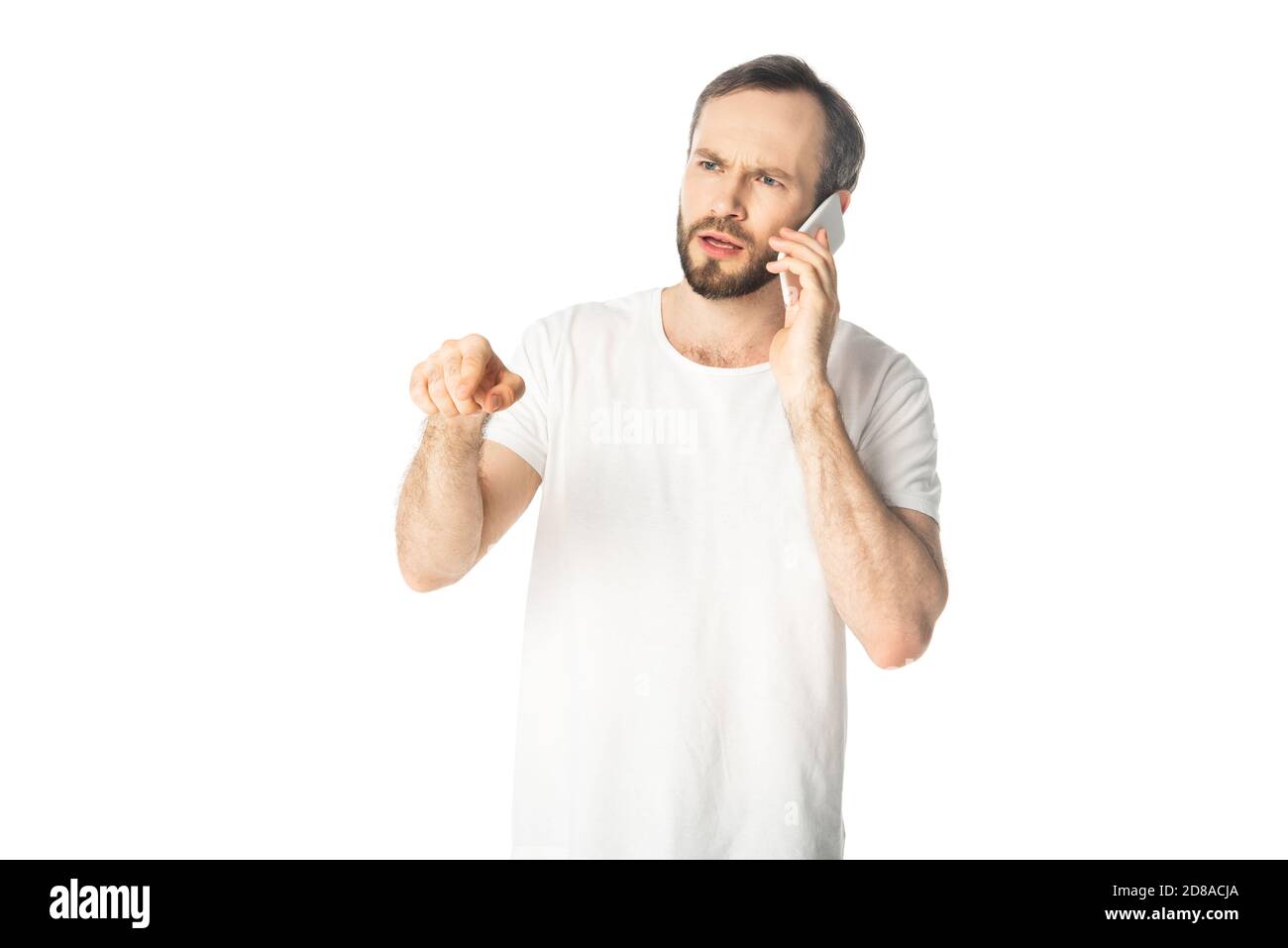 angry man talking on smartphone and gesturing isolated on white Stock ...