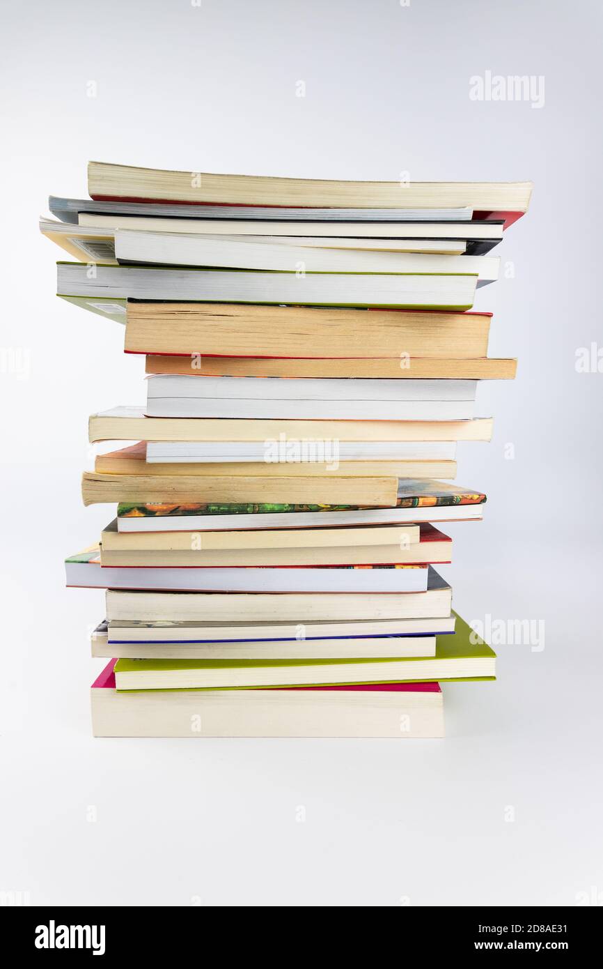 Stack of books one on top of the other. a lot of books for studying ...