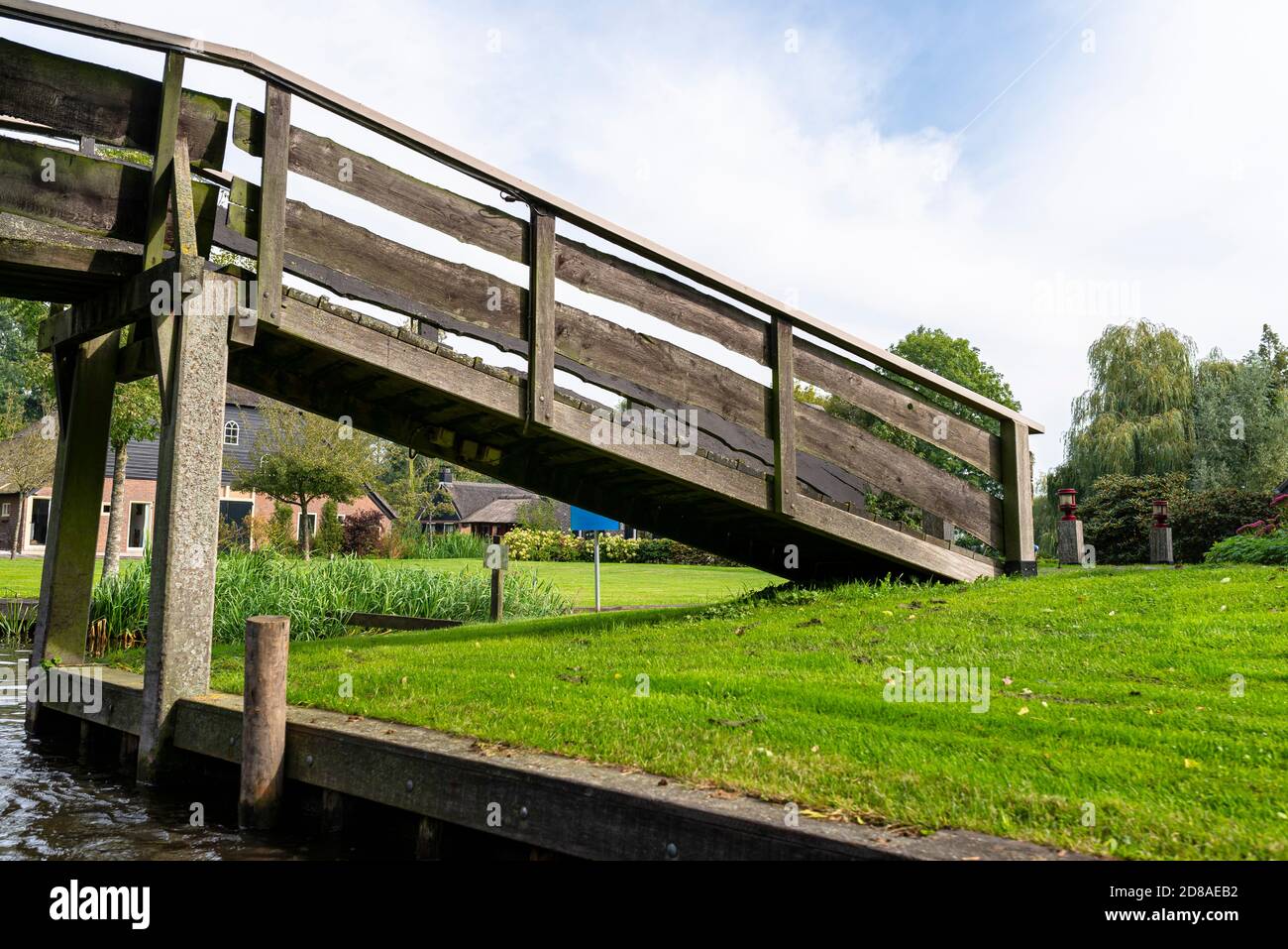 Wooden decorative footbridge over a canal in the Netherlands in the ...