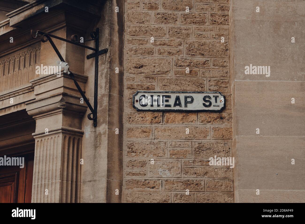 Street name sign on a brick wall of a building on Cheap Street, Frome ...