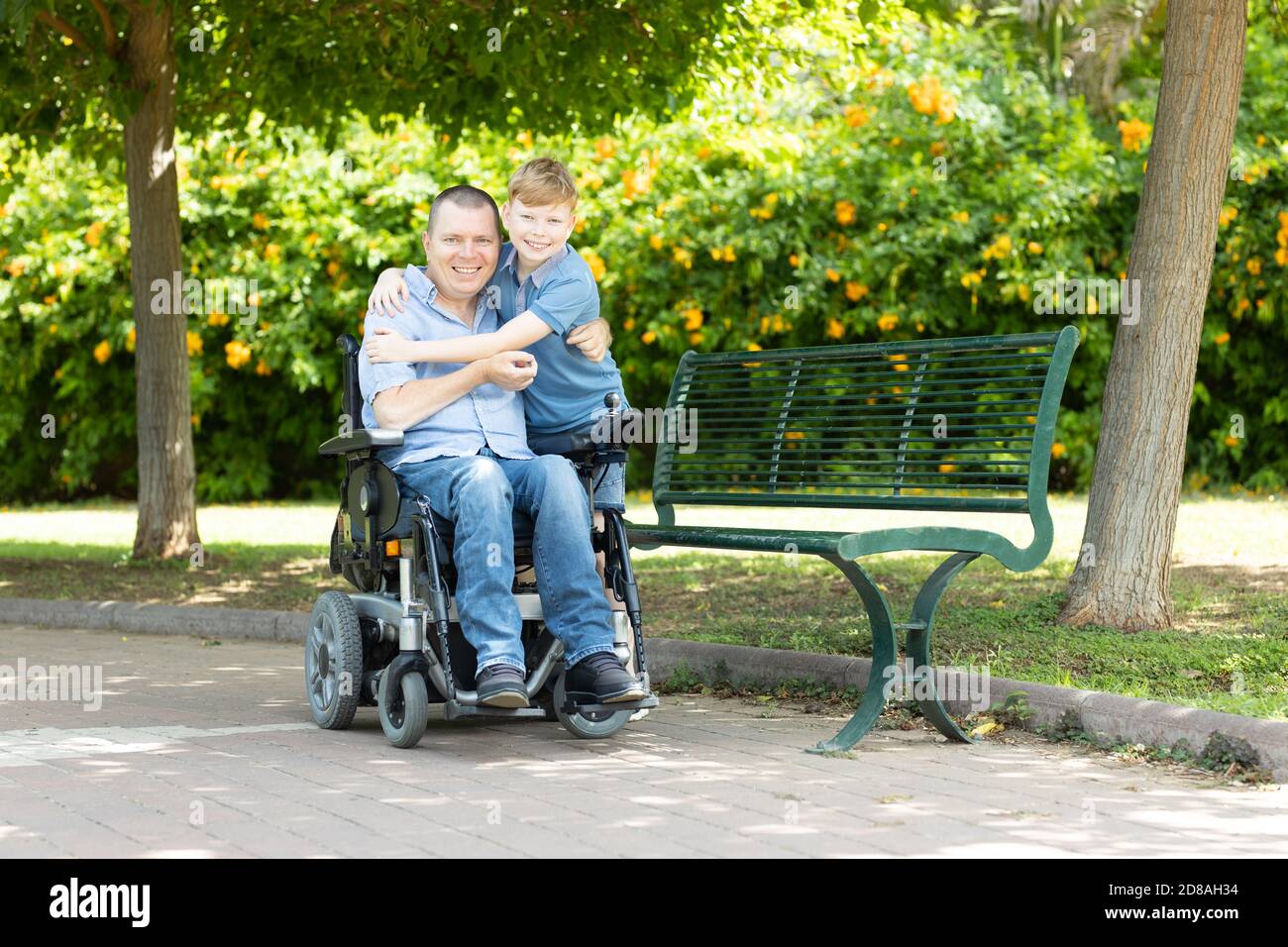 Disabled father with his little son Stock Photo - Alamy