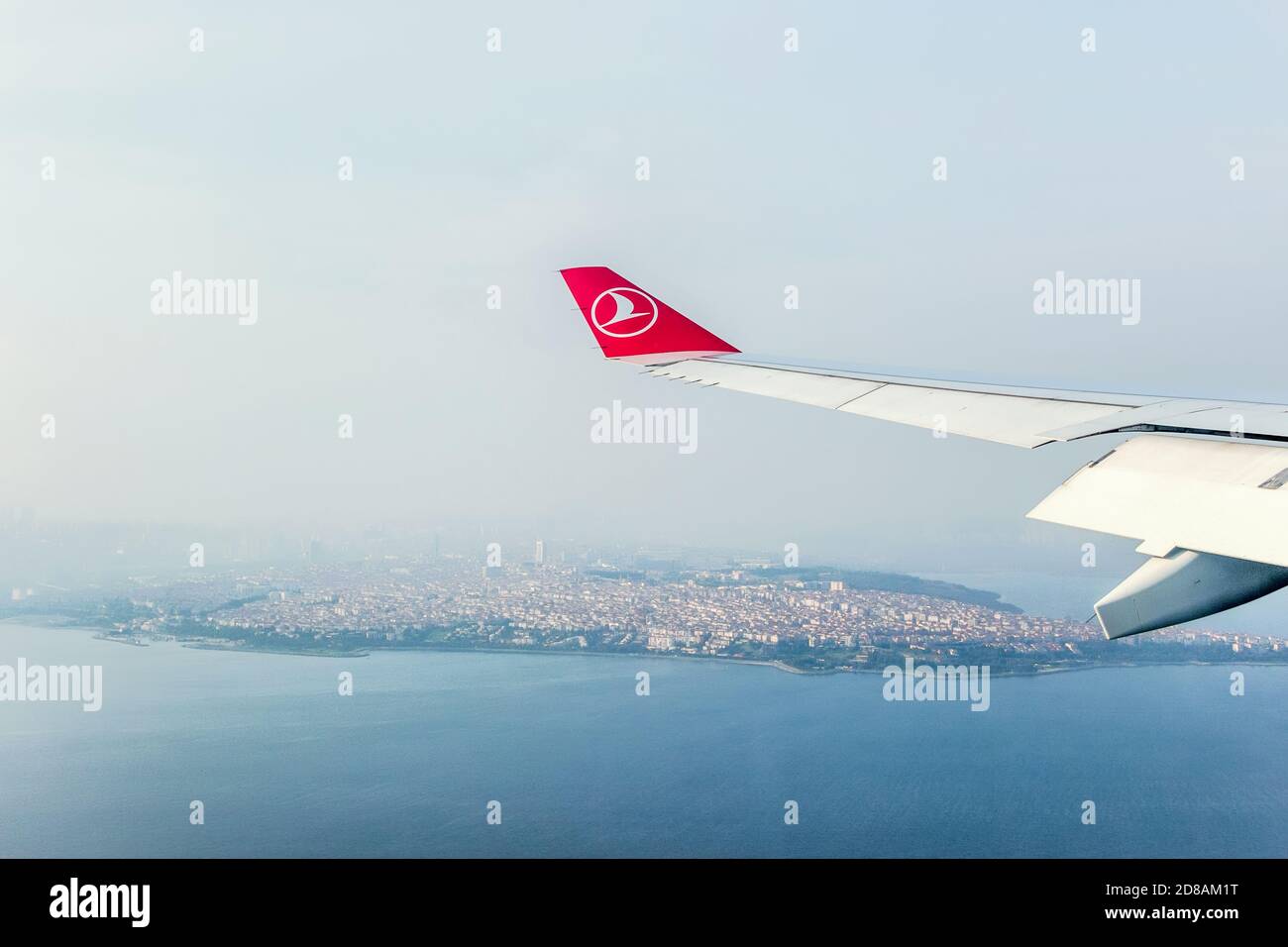 Turkish airplane wing in blue sky Stock Photo - Alamy