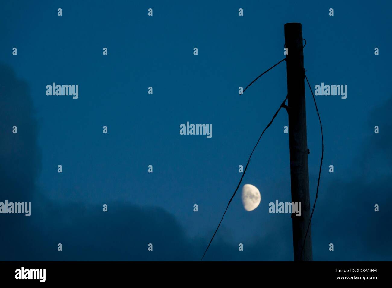 Moon shine, telegraph pole Stock Photo - Alamy