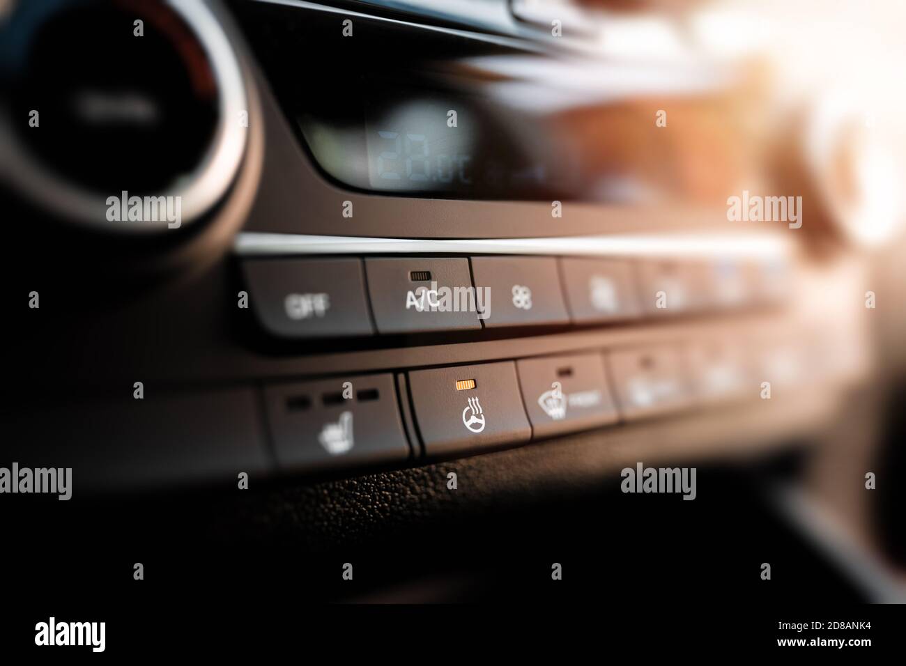 Interior view of a modern new car. Climatronic or air conditioner ...