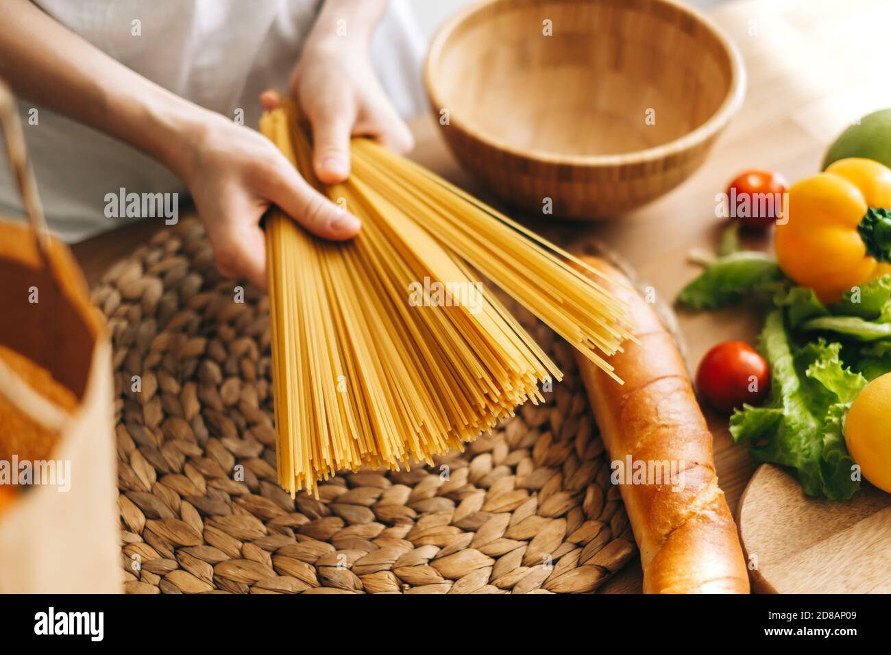 Female chief cook holding pasta hi-res stock photography and images - Alamy