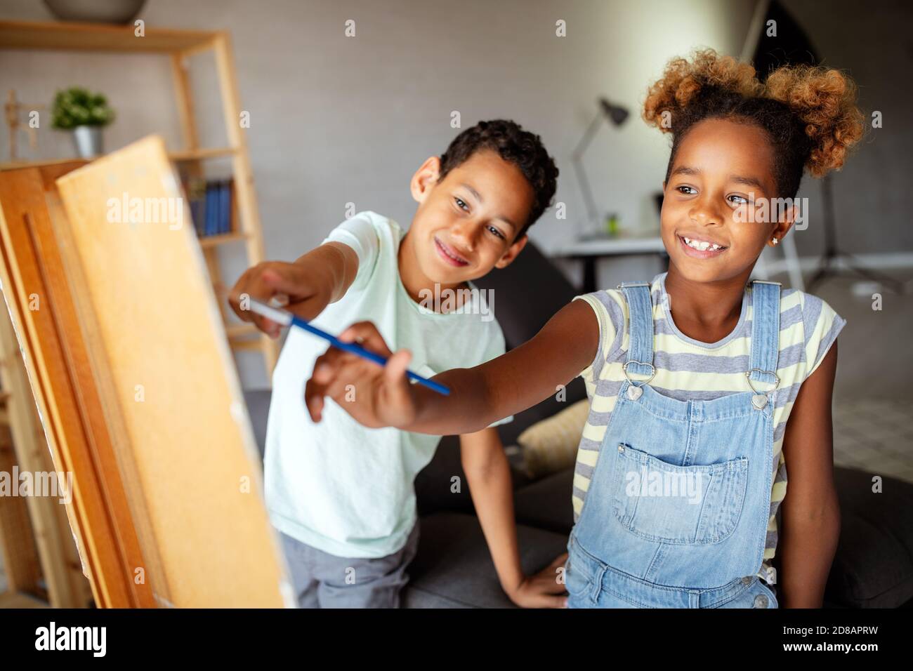 Concept of early childhood education, painting, talent, happy kids ...