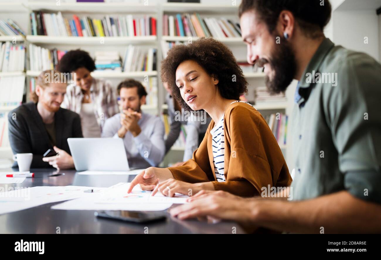 Businesspeople discussing together in conference room during meeting at ...