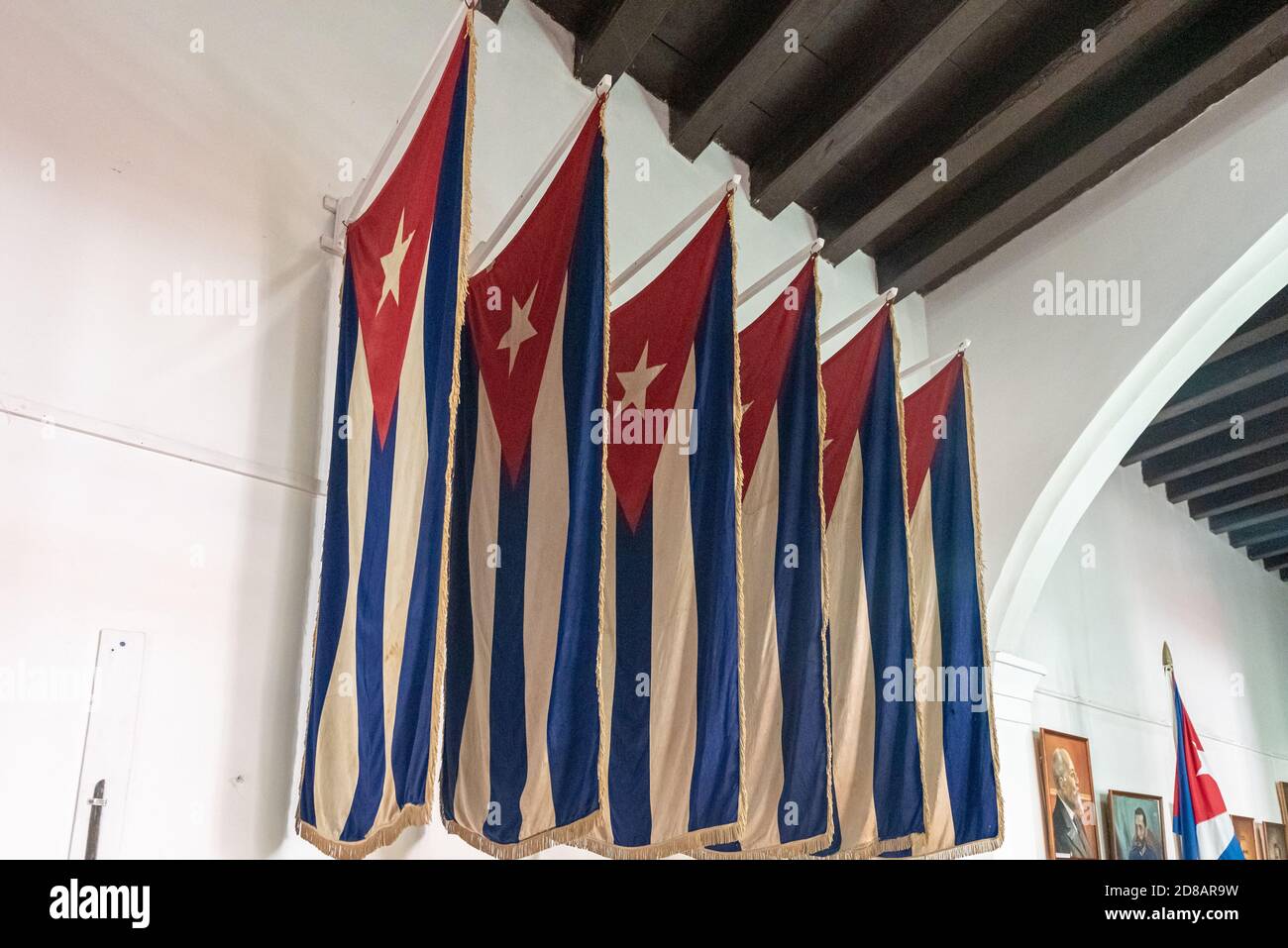 Ancient Cuban flags, Casa Consistorial, Holguin, Cuba Stock Photo - Alamy
