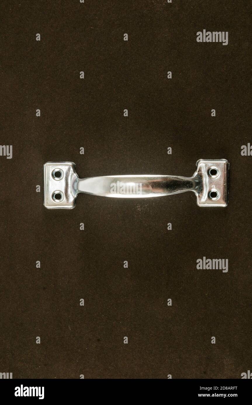 Metal case handle Stock Photo - Alamy