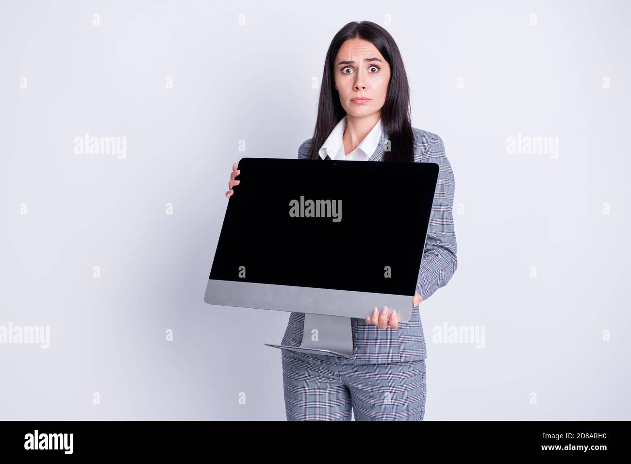 Photo of attractive fired sad terrified lady hold big computer monitor ...
