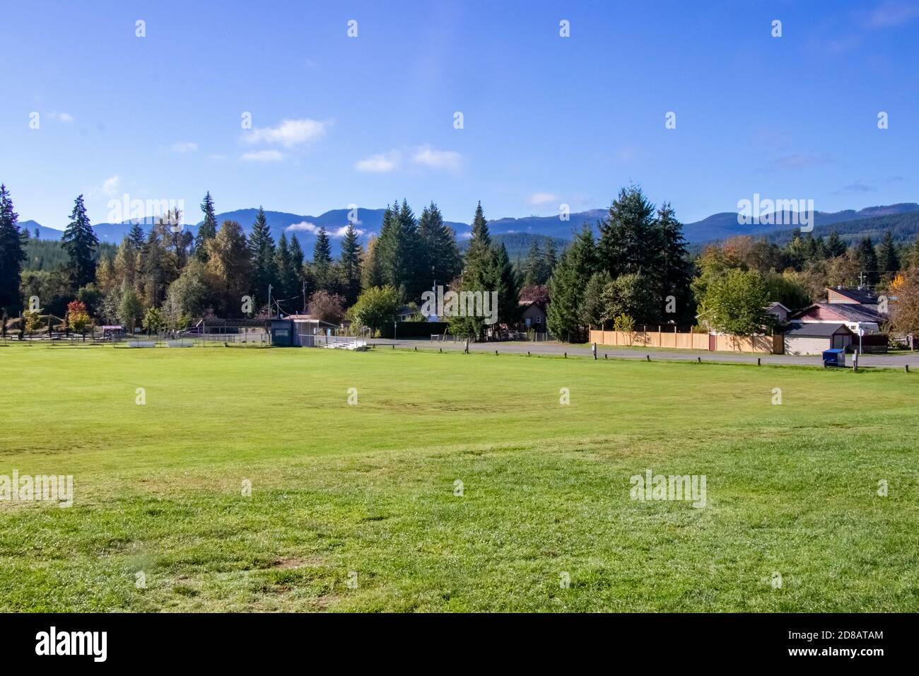 Cumberland Community Water Park at sunny day with mountains in the ...