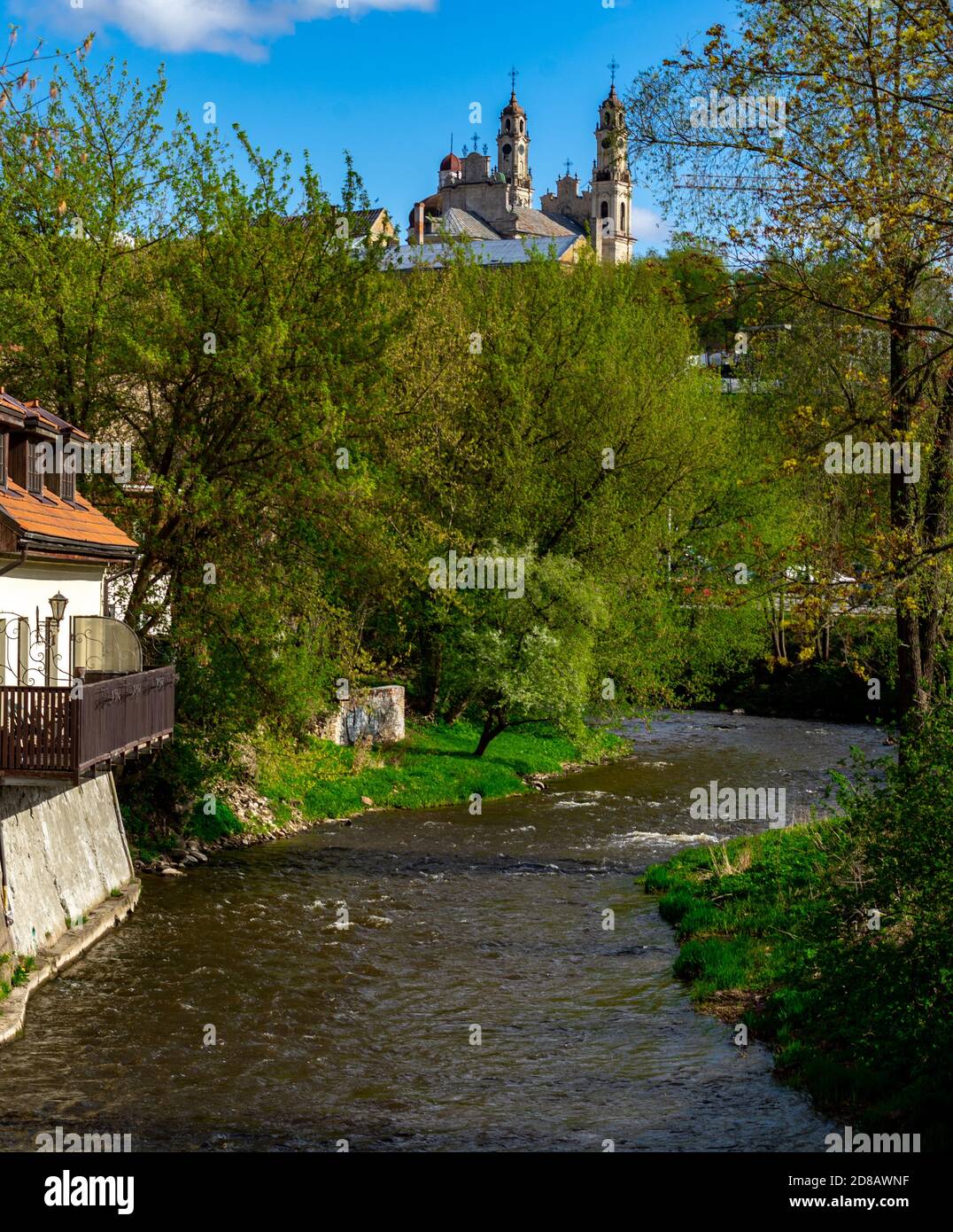 April 27, 2018 Vilnius, Lithuania, Vilnius River and Catholic church of ...
