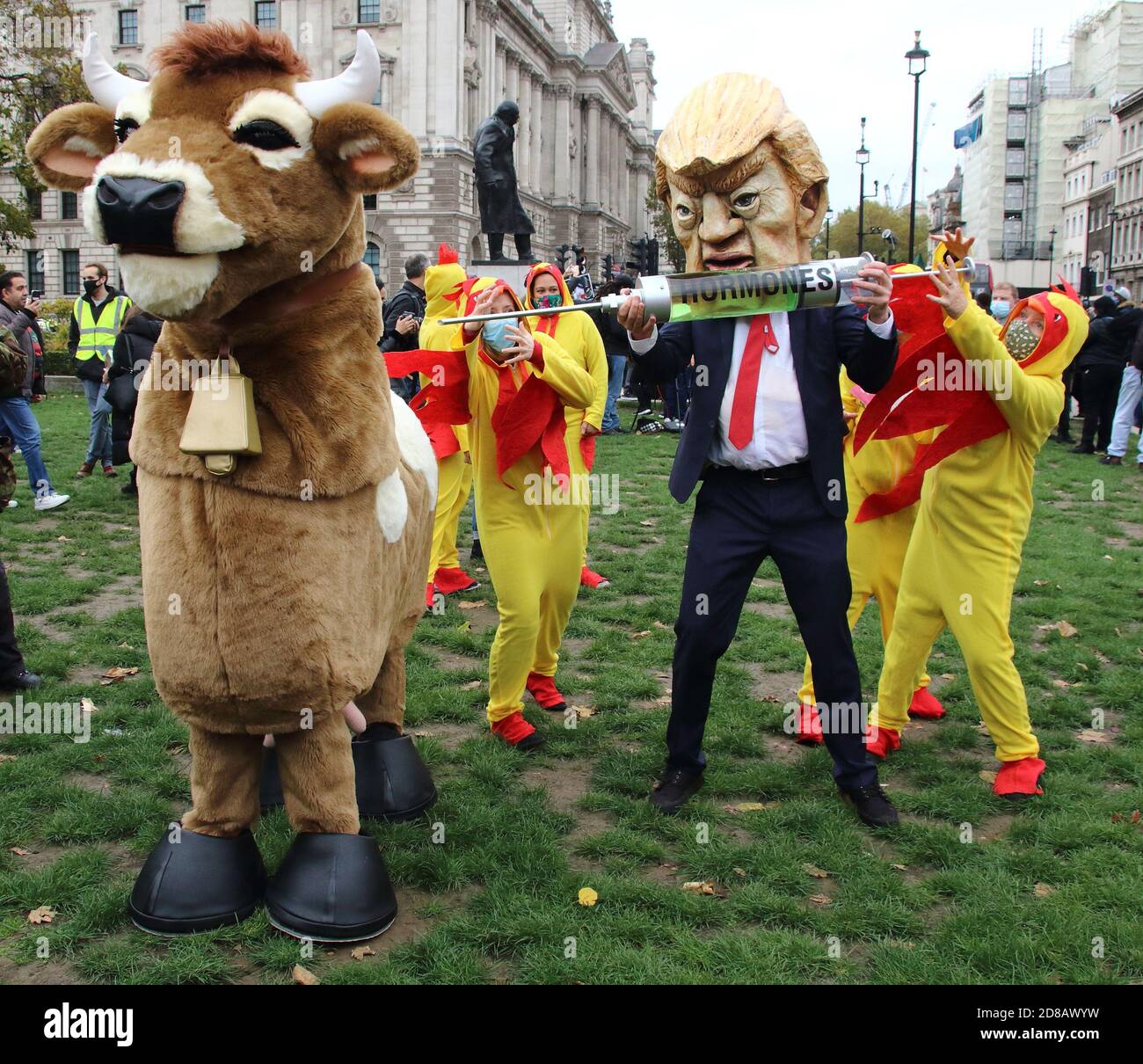 London, UK. A fake US President Donald Trump, a pantomime cow and ...