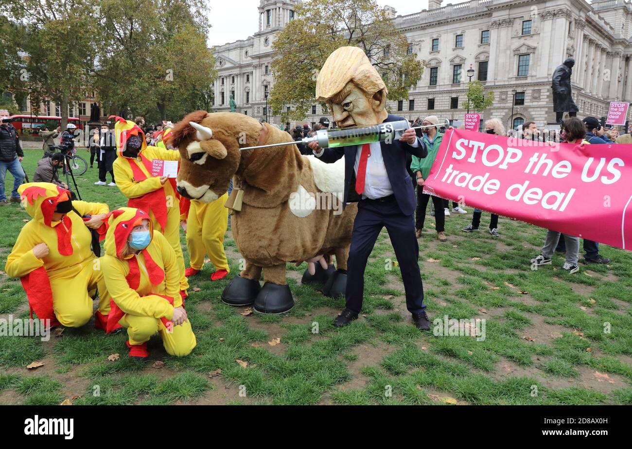 London, UK. A fake US President Donald Trump, a pantomime cow and ...
