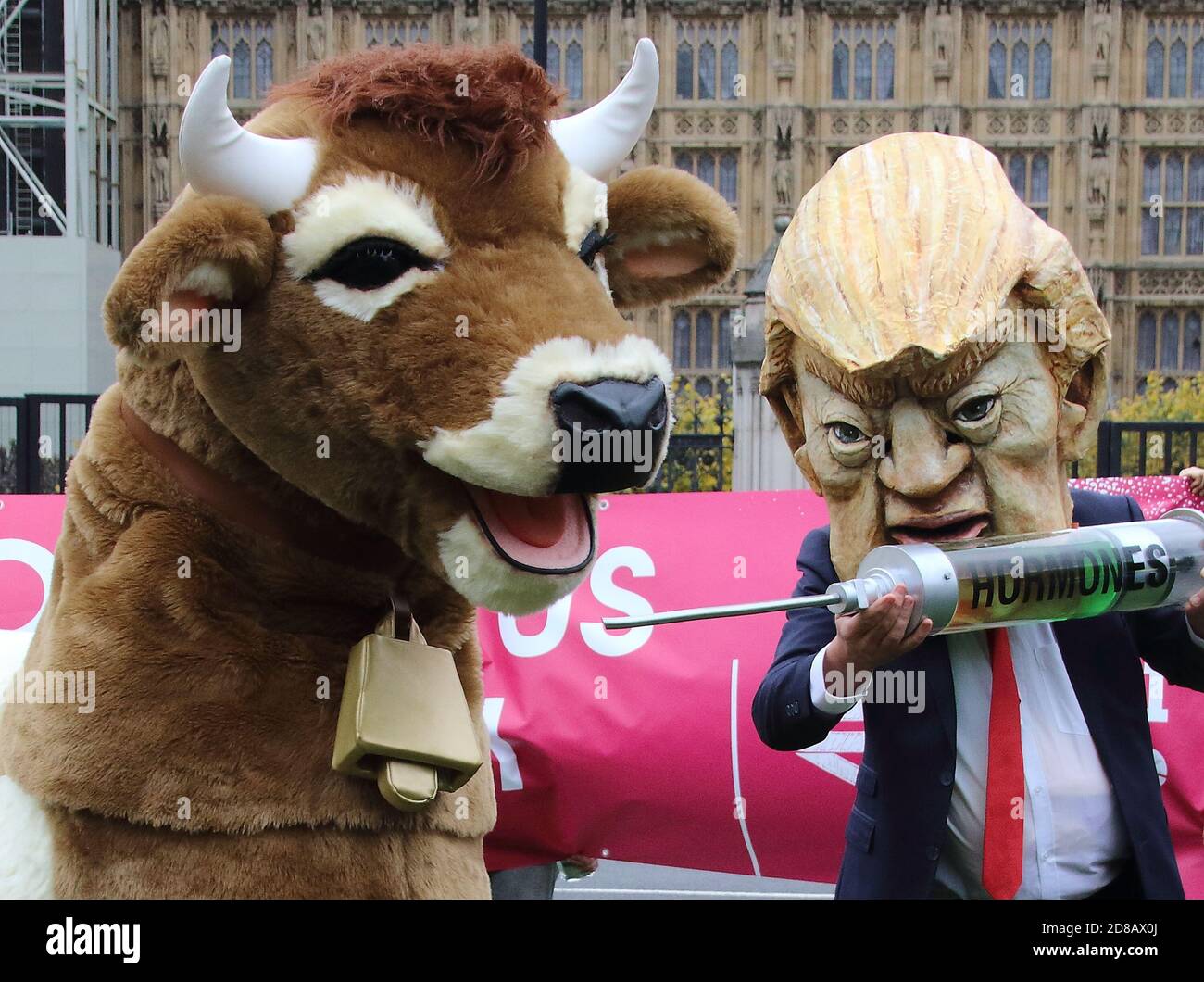 London, UK. A fake US President Donald Trump, a pantomime cow and ...