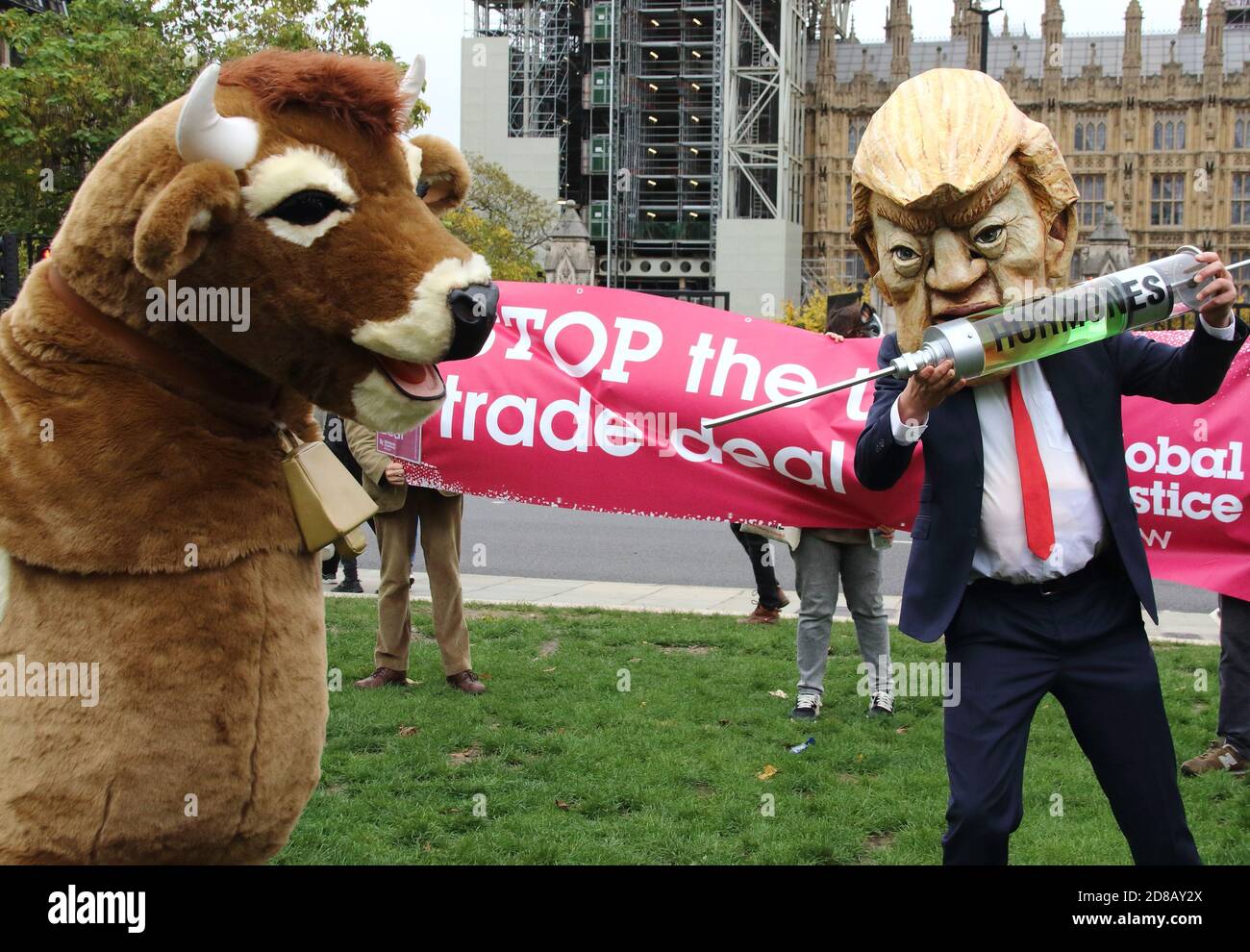 London, UK. A fake US President Donald Trump, a pantomime cow and ...