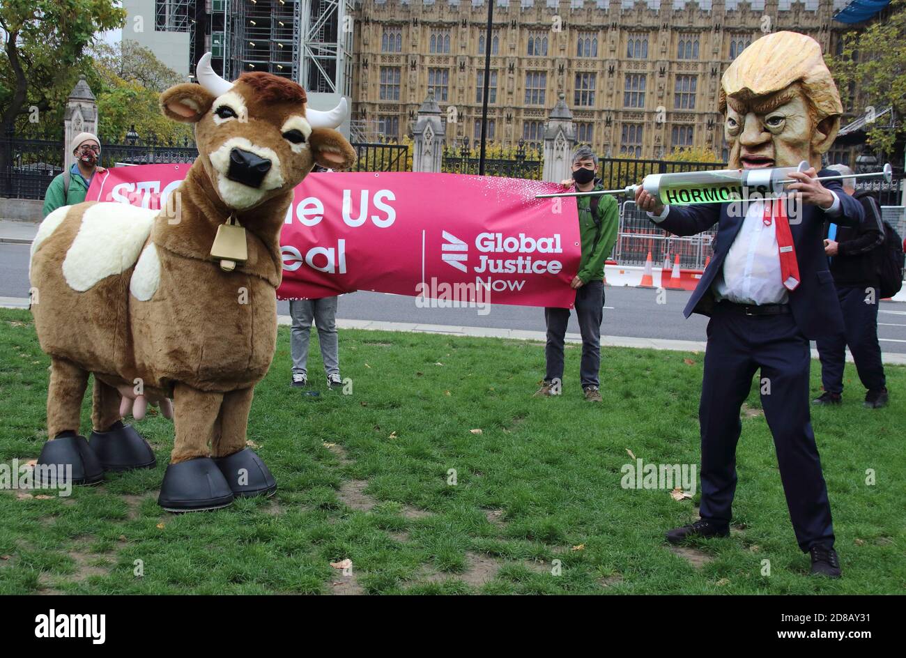 London, UK. A fake US President Donald Trump, a pantomime cow and ...