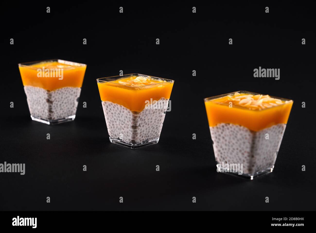 Front view of fresh pudding with natural organic soya milk, chia seeds ...