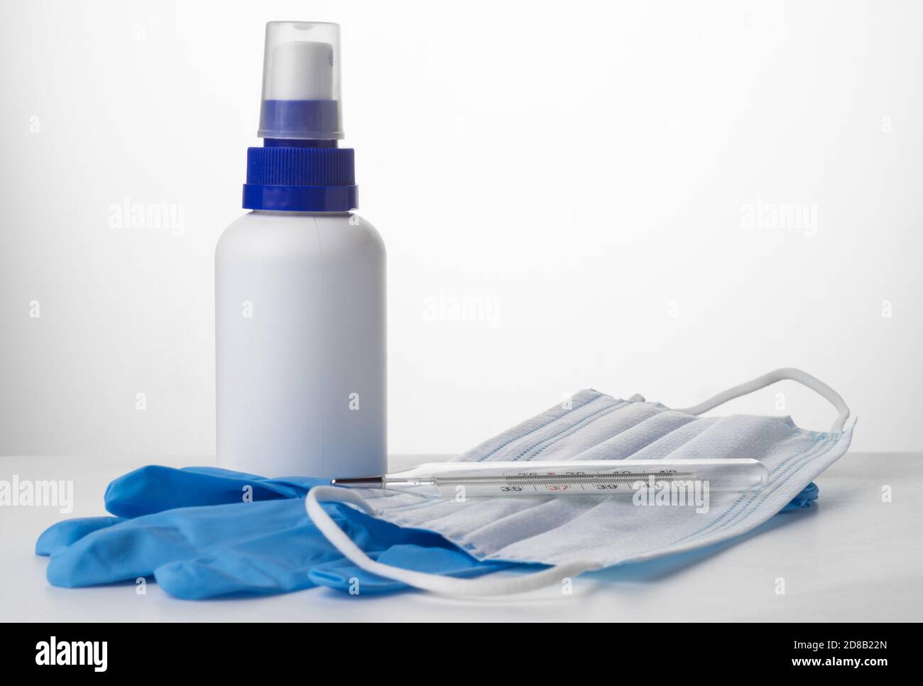 Individual protection means. Gloves, protectiv mask, thermometer and ...