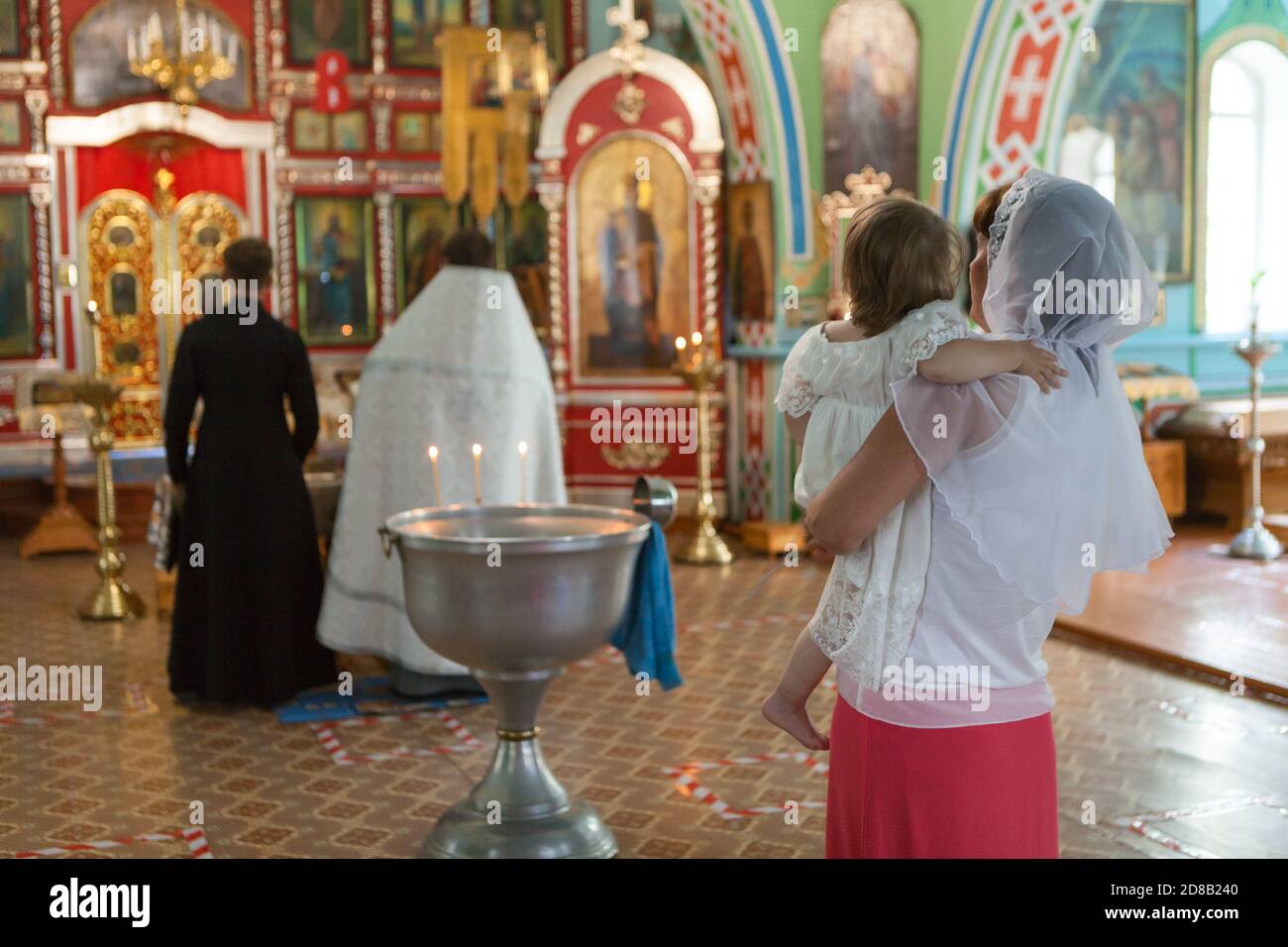 Baptismal ceremony baptismal ceremony hi-res stock photography and ...