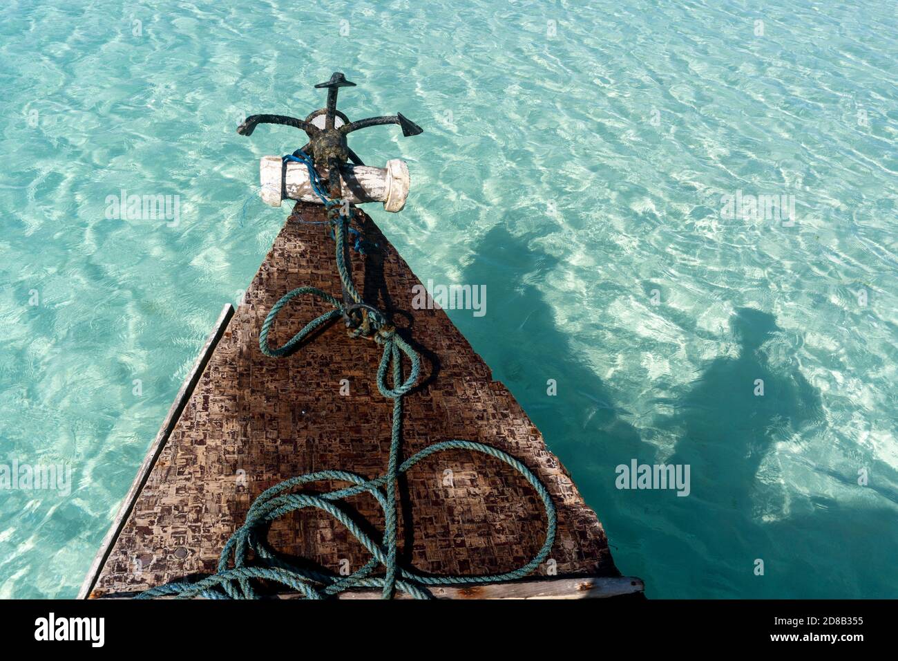 Bow side of Traditional Zanzibar Dhow boat with anchor and Rope at the ...