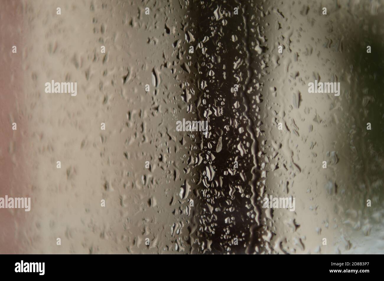 A close up shot of water droplets on a glass window pane Stock Photo ...