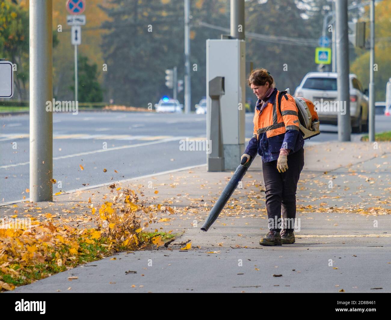 Leaf blower female hi-res stock photography and images - Alamy