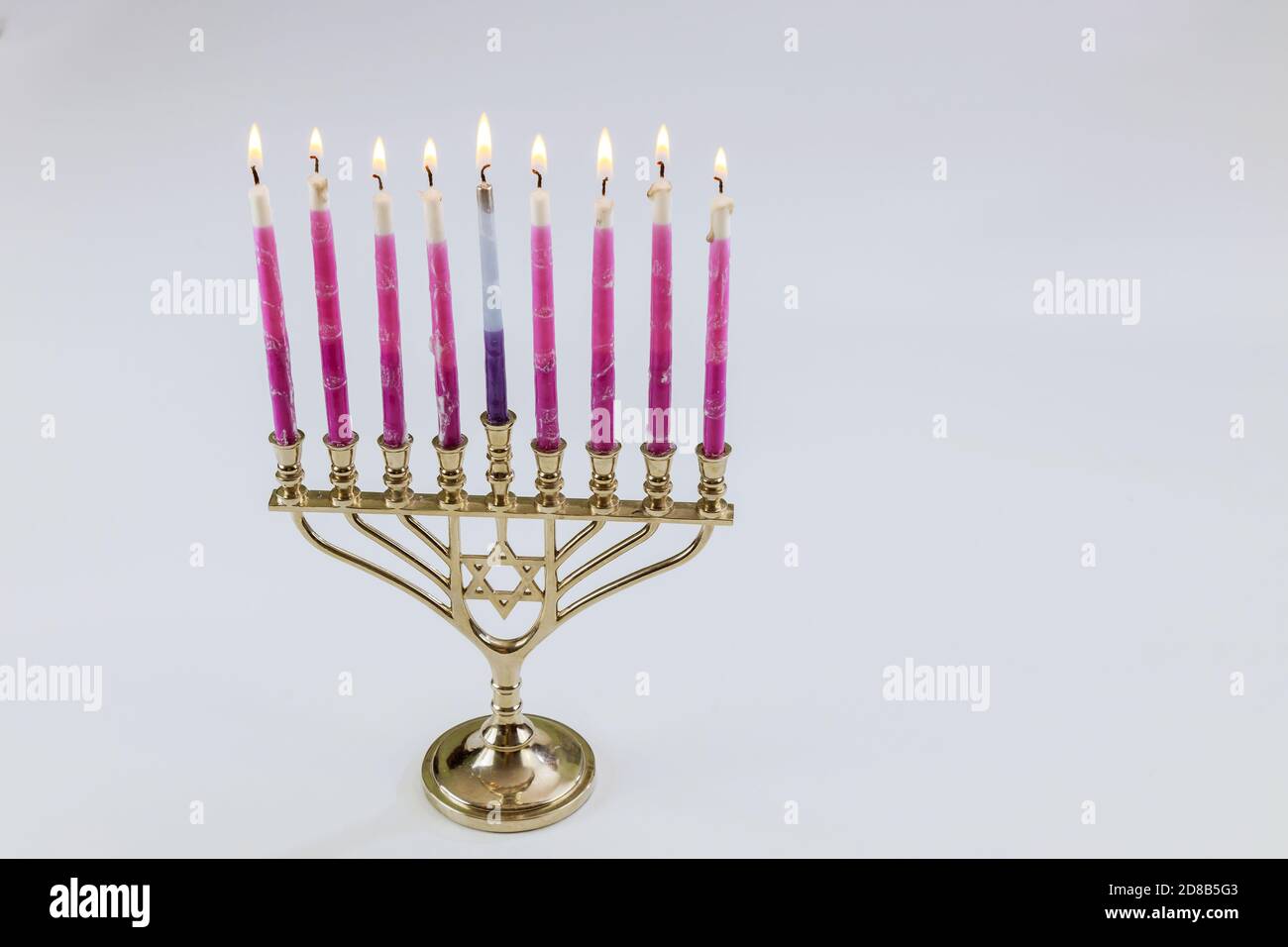 Traditional symbol hebrew Menorah of Hanukkah with burning candles in ...